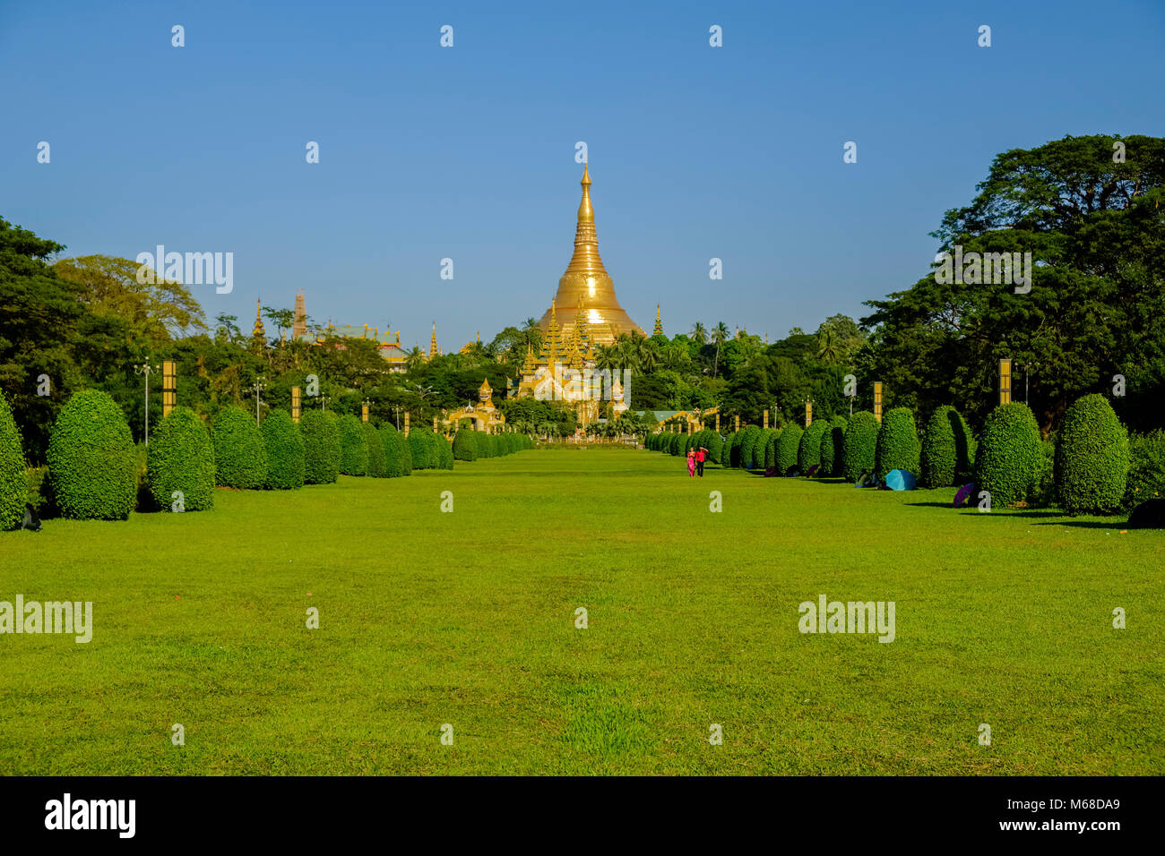 The golden Shwedagon pagoda, the most sacred pagoda of Myanmar, is ...