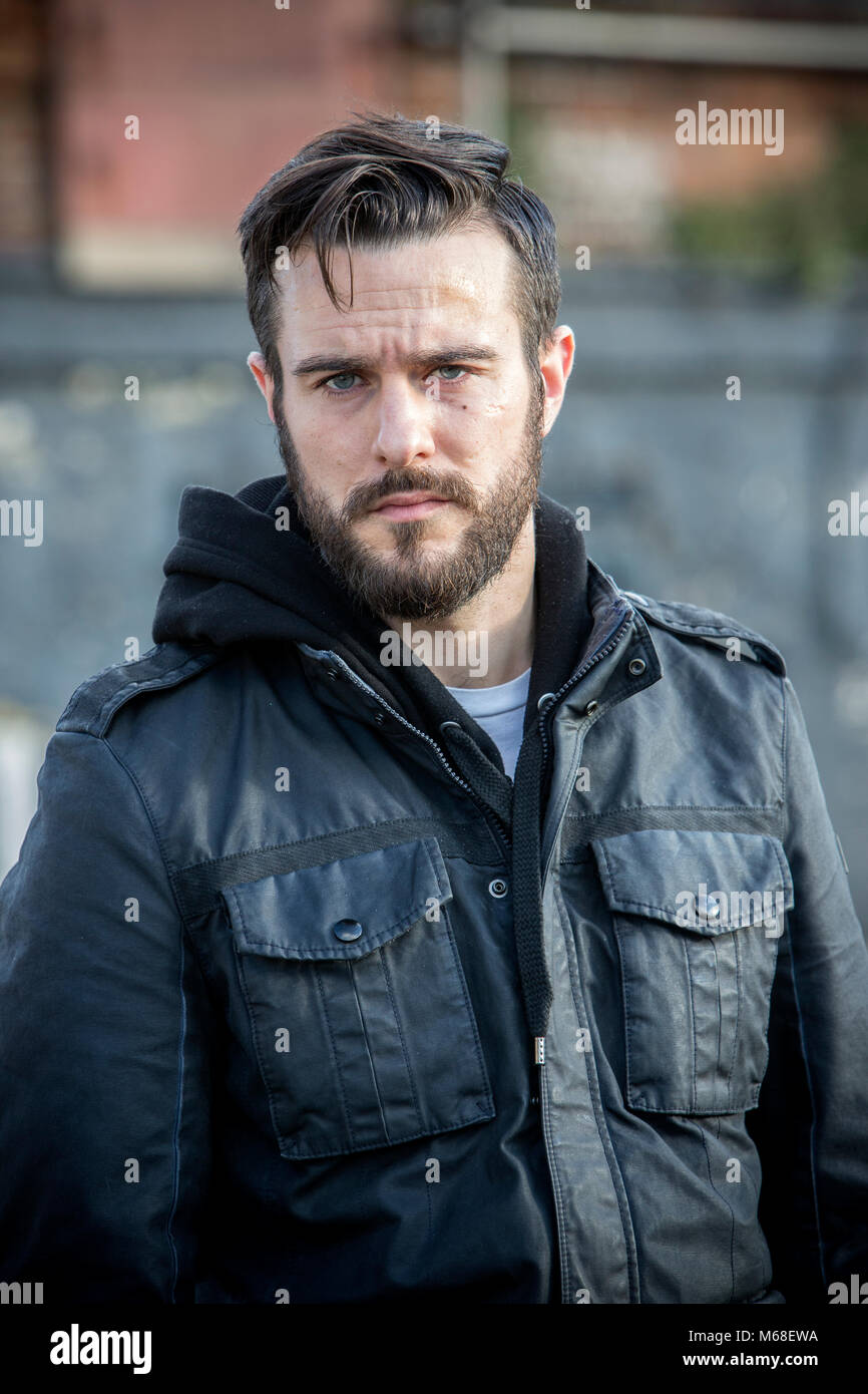 Bearded young man Stock Photo - Alamy