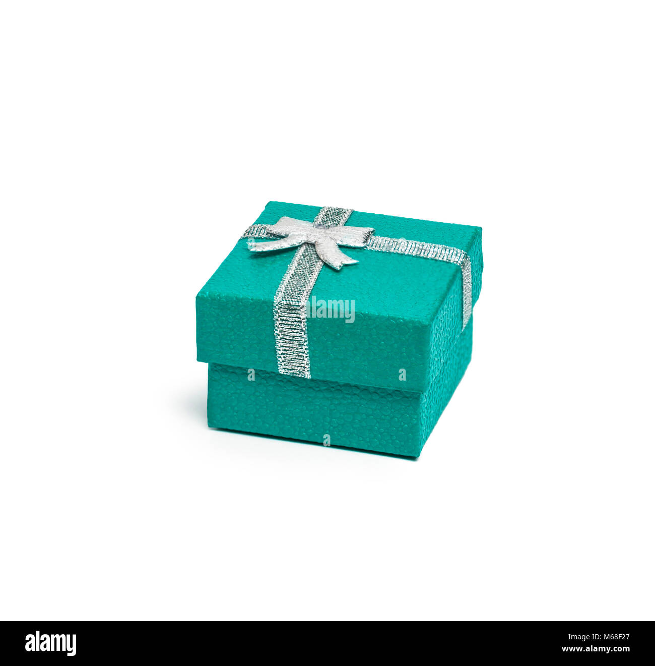 Teal gift box with silver ribbon isolated on white background Stock ...
