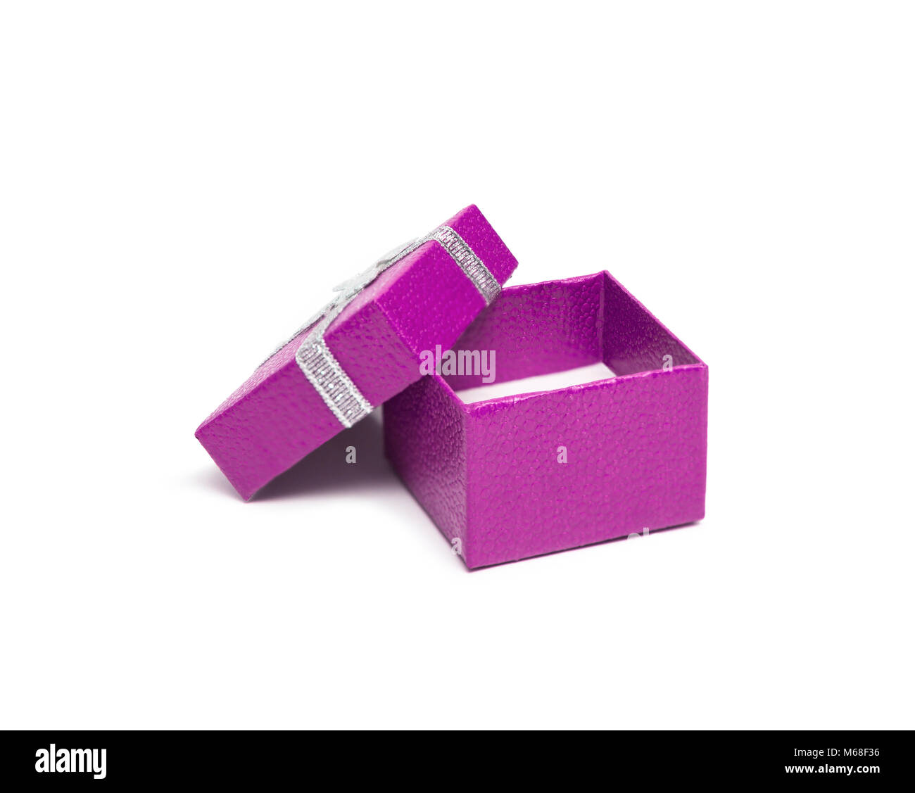 Open Purple gift box with silver ribbon isolated on white background ...