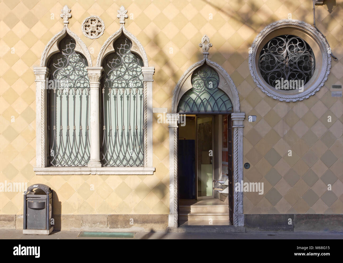 Facade of a gothic historic palace Stock Photo - Alamy