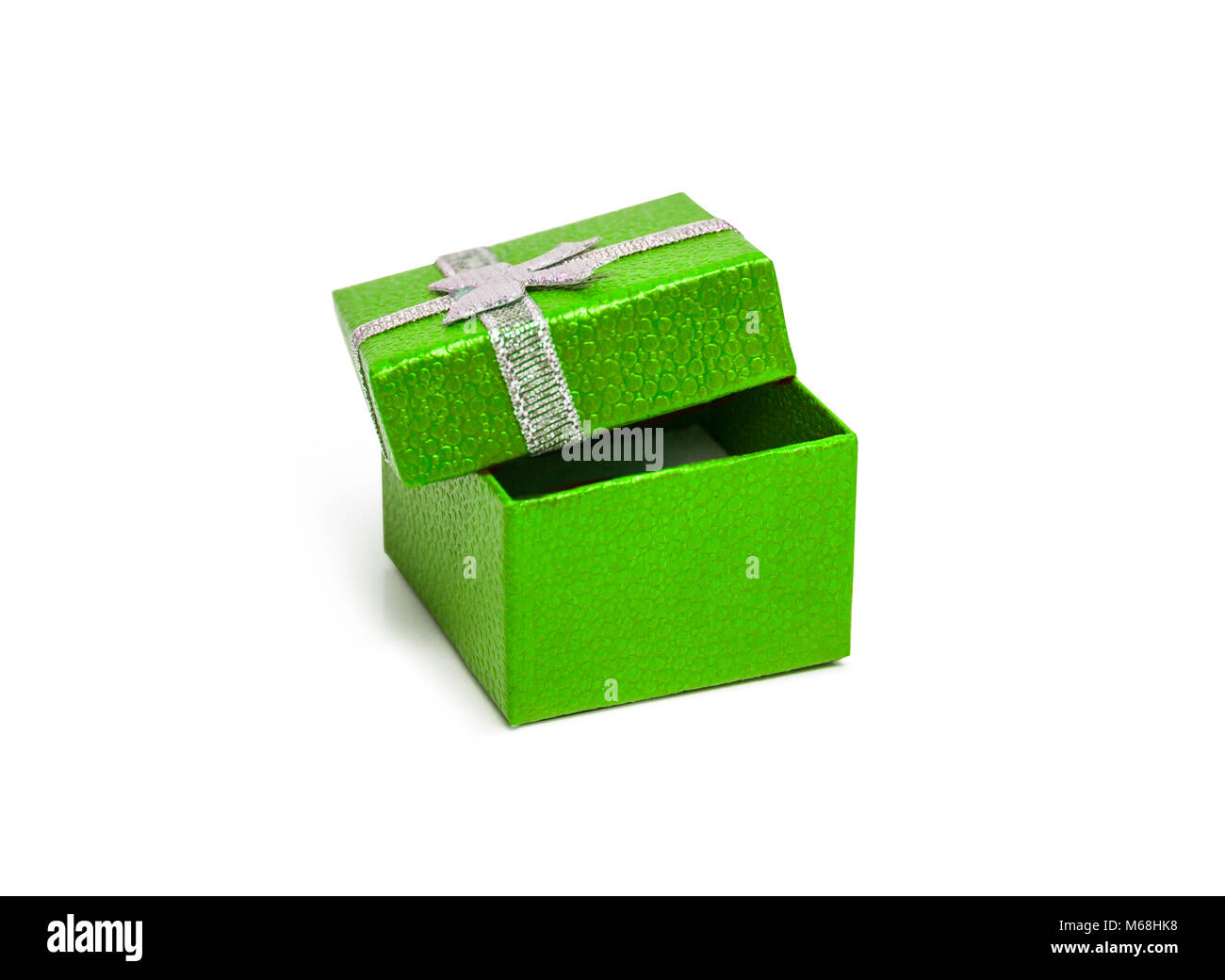 Open Green color gift box with silver ribbon isolated on white ...