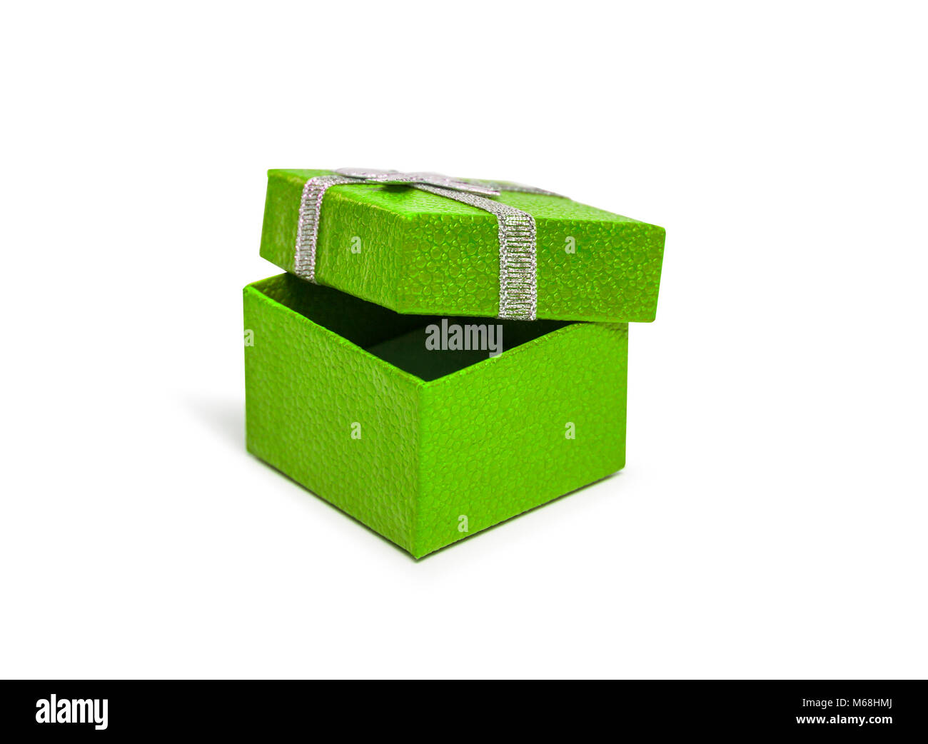 Open Green gift box with silver ribbon isolated on white background ...