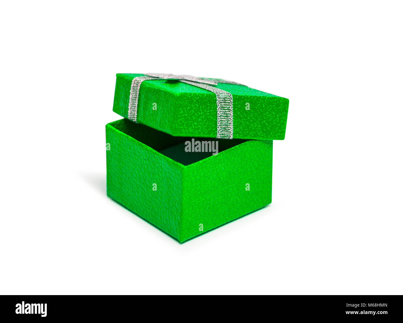 Open Green gift box with silver ribbon isolated on white background ...