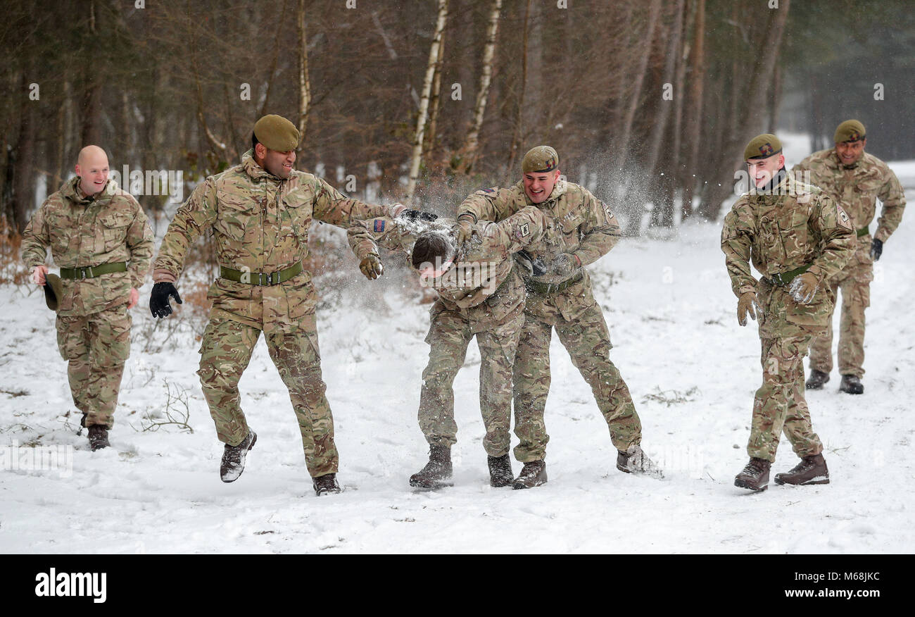 Members of 1st Battalion Welsh Guards take part in a snow ball fight ...
