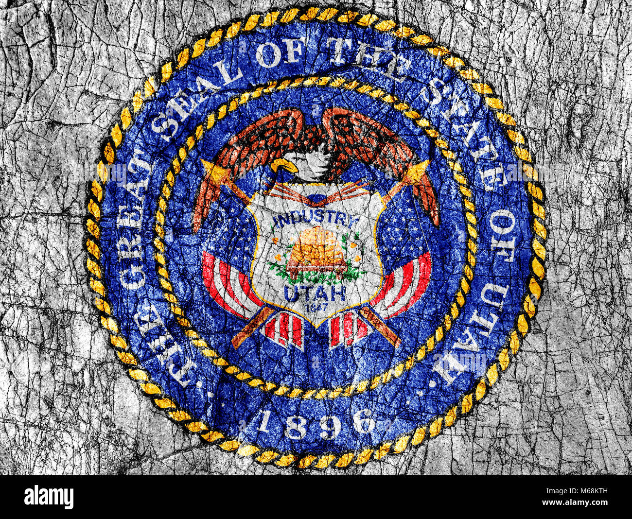 Grudge stone painted Utah seal flag Stock Photo - Alamy