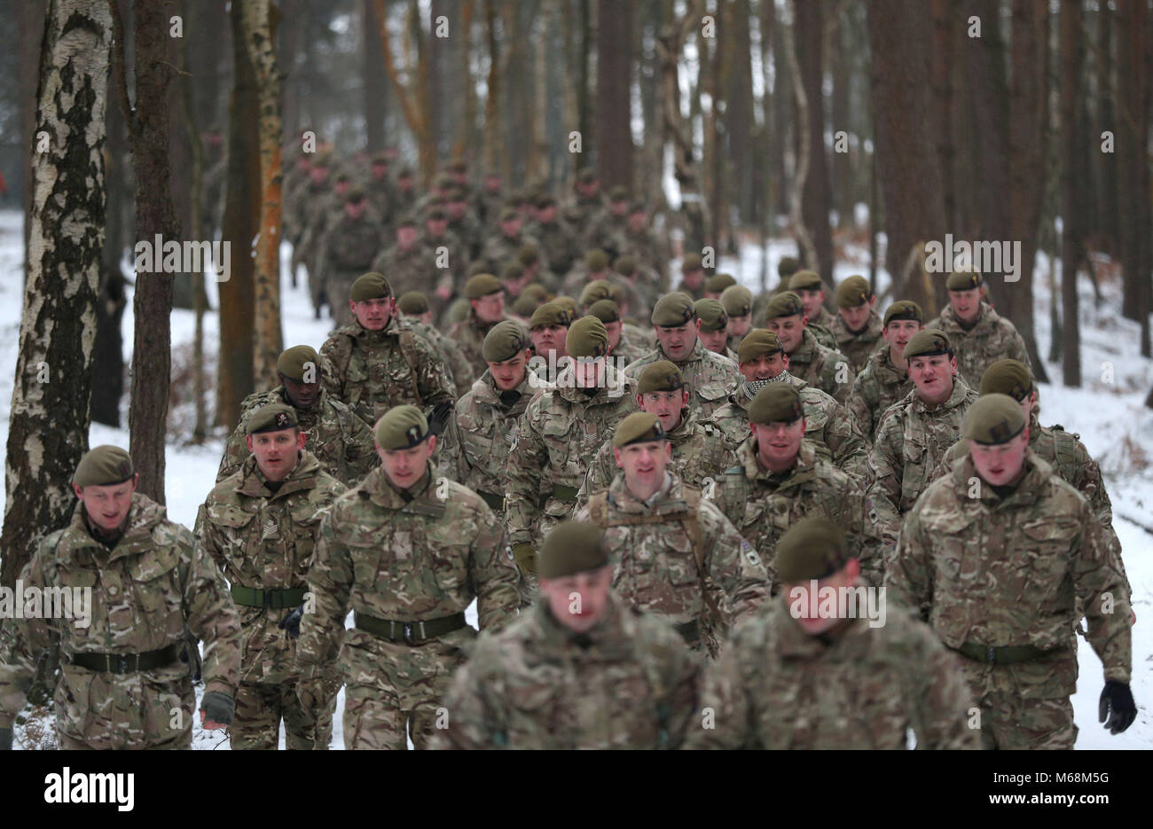 Members of 1st Battalion Welsh Guards make their way from their ...