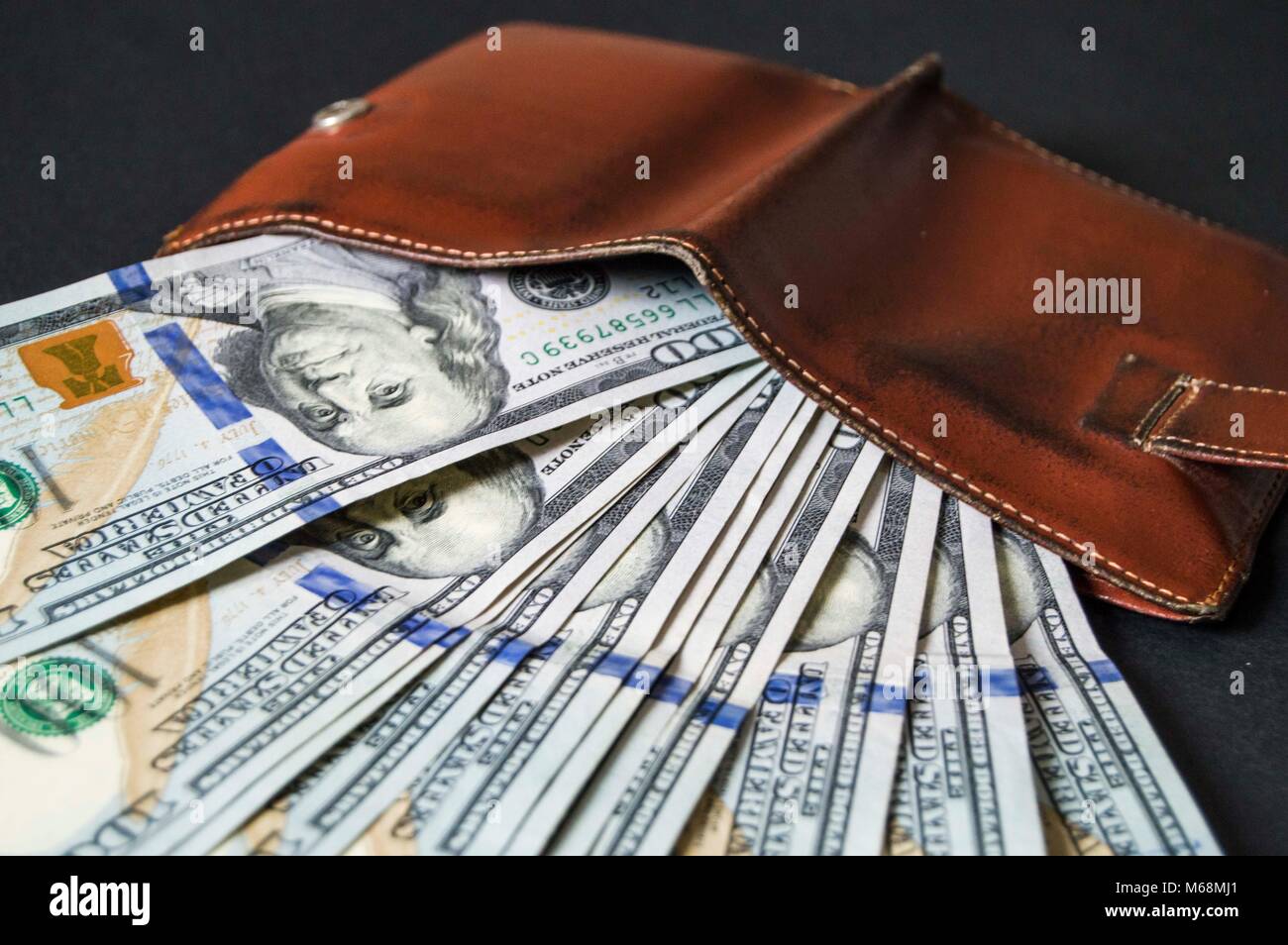 $ 100 in the wallet Stock Photo - Alamy