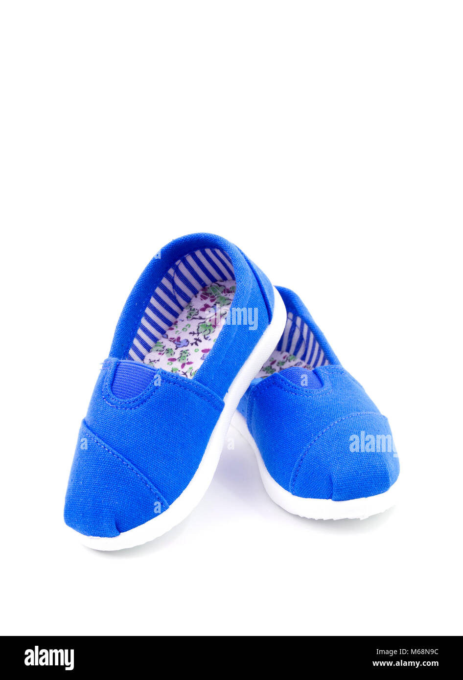 Pair of Blue Children's Shoes on a White Background Stock Photo - Alamy