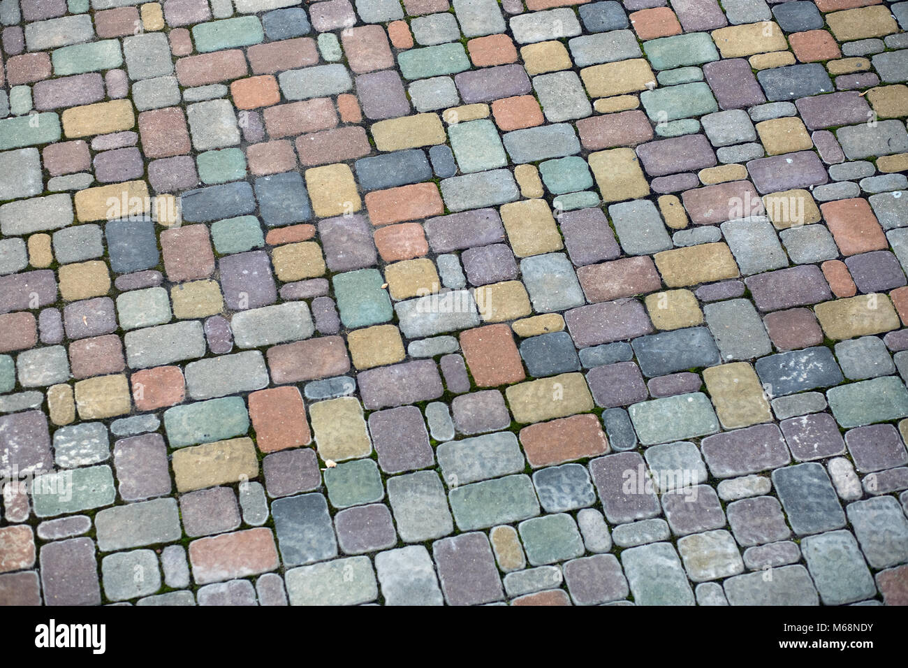 Multicolored paving slabs. Pavement background. Cobblestone texture ...