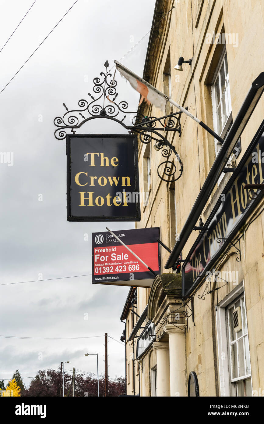 For Sale sign, pub sign and the remains of an England flag on The Crown ...