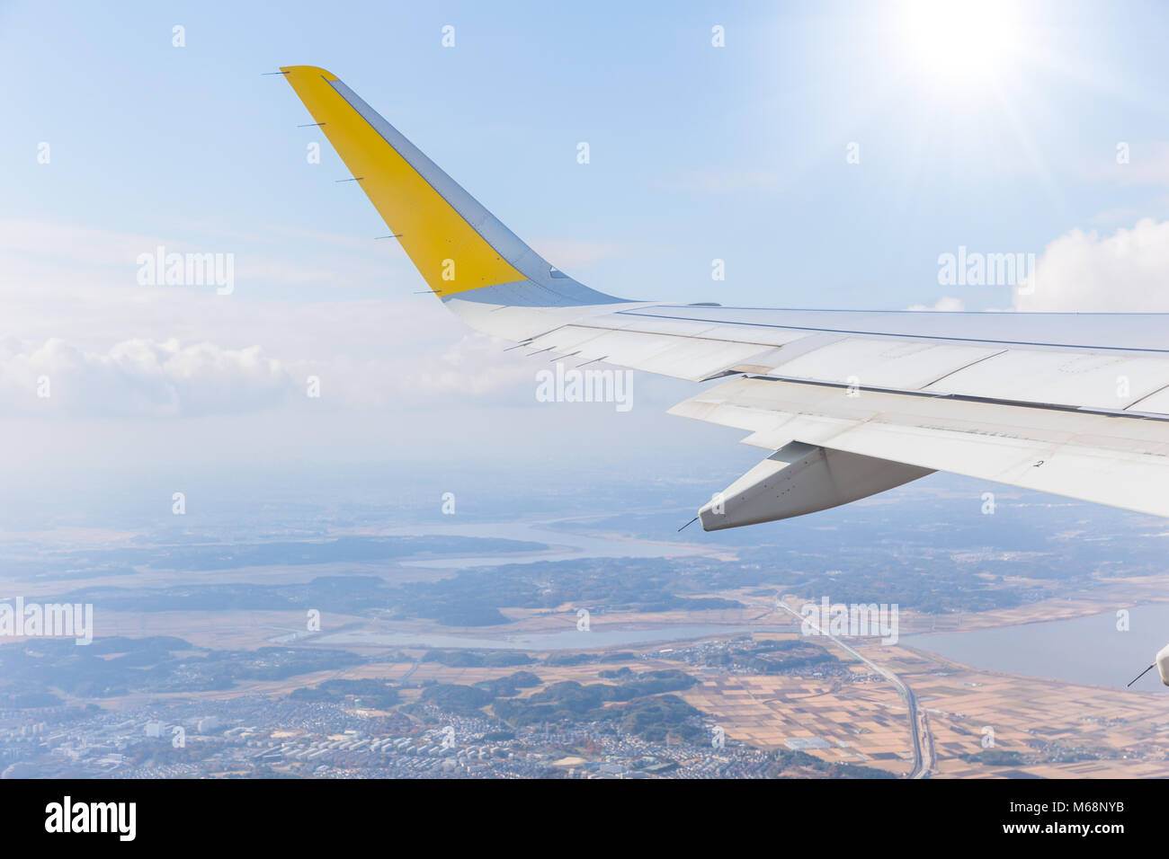 plane wing flying over earth landscape view background Stock Photo - Alamy