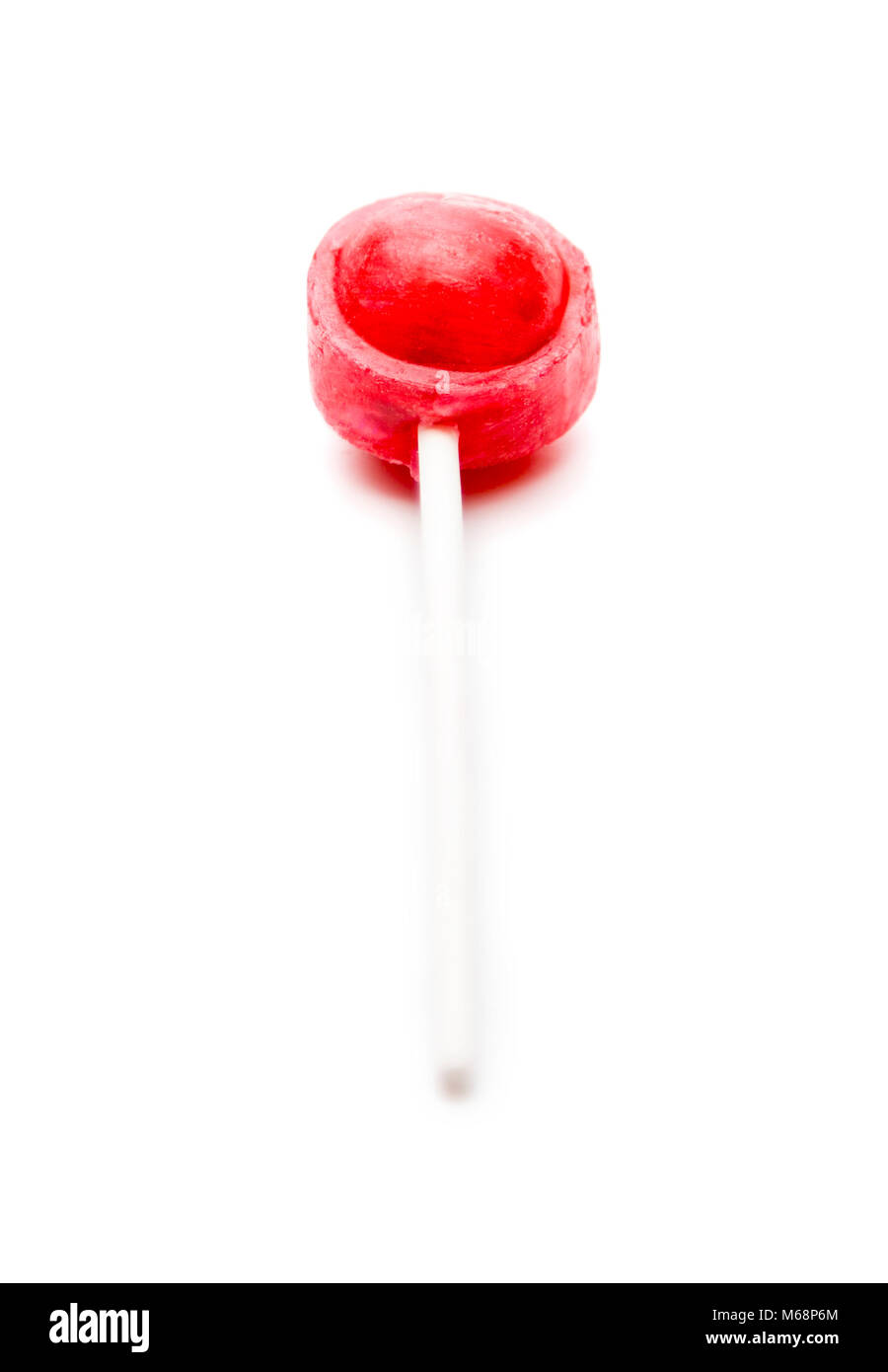 Single Red Lollipop on a White Background Stock Photo - Alamy