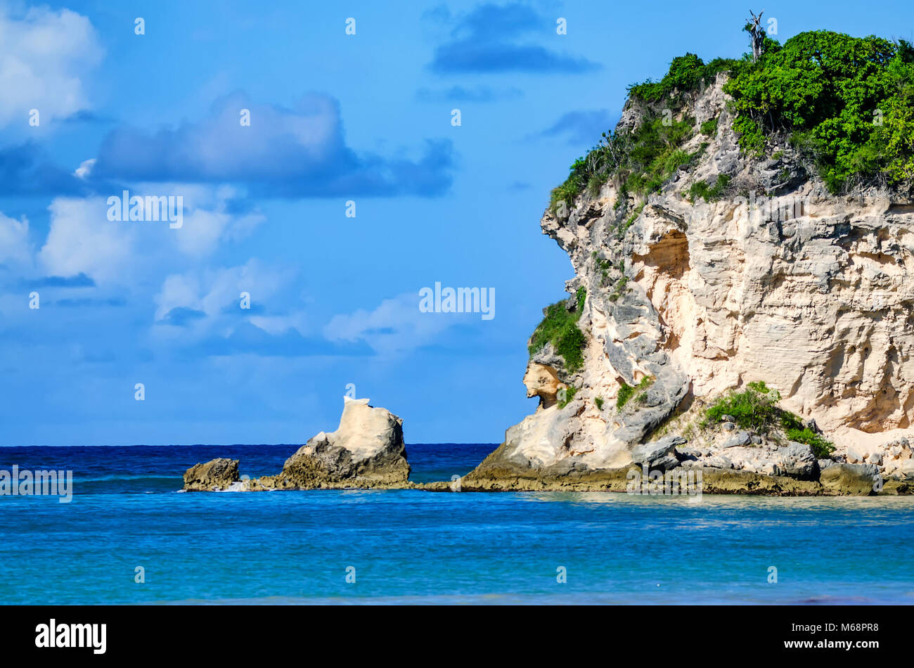 Beautiful tropical lanscape with cliff in ocean Stock Photo - Alamy