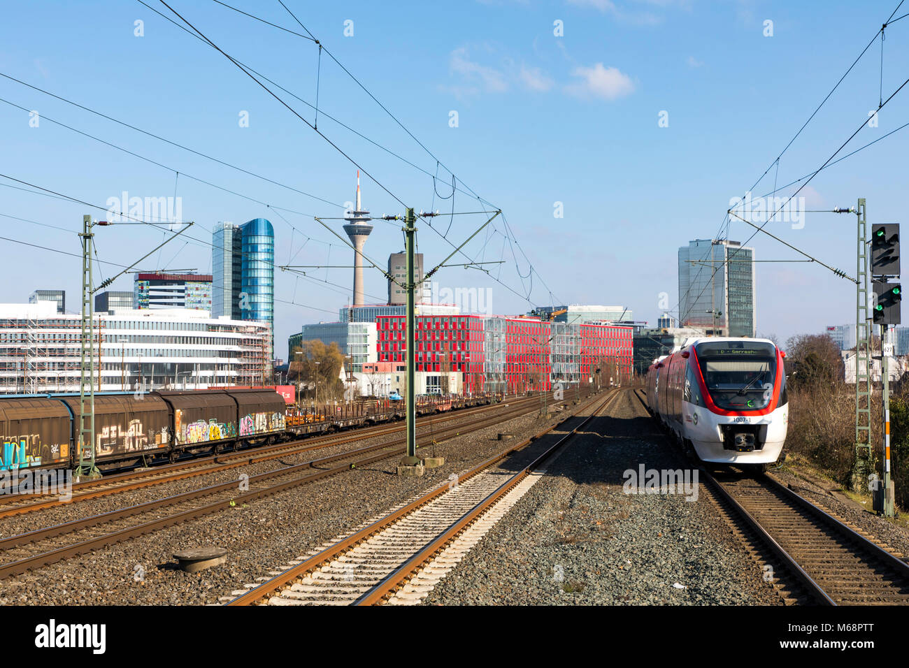 S-Bahn, Local train station, Dusseldorf-Hamm stop, the skyline of ...