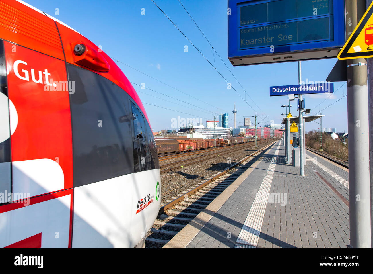 S-Bahn, Local train station, Dusseldorf-Hamm stop, the skyline of ...