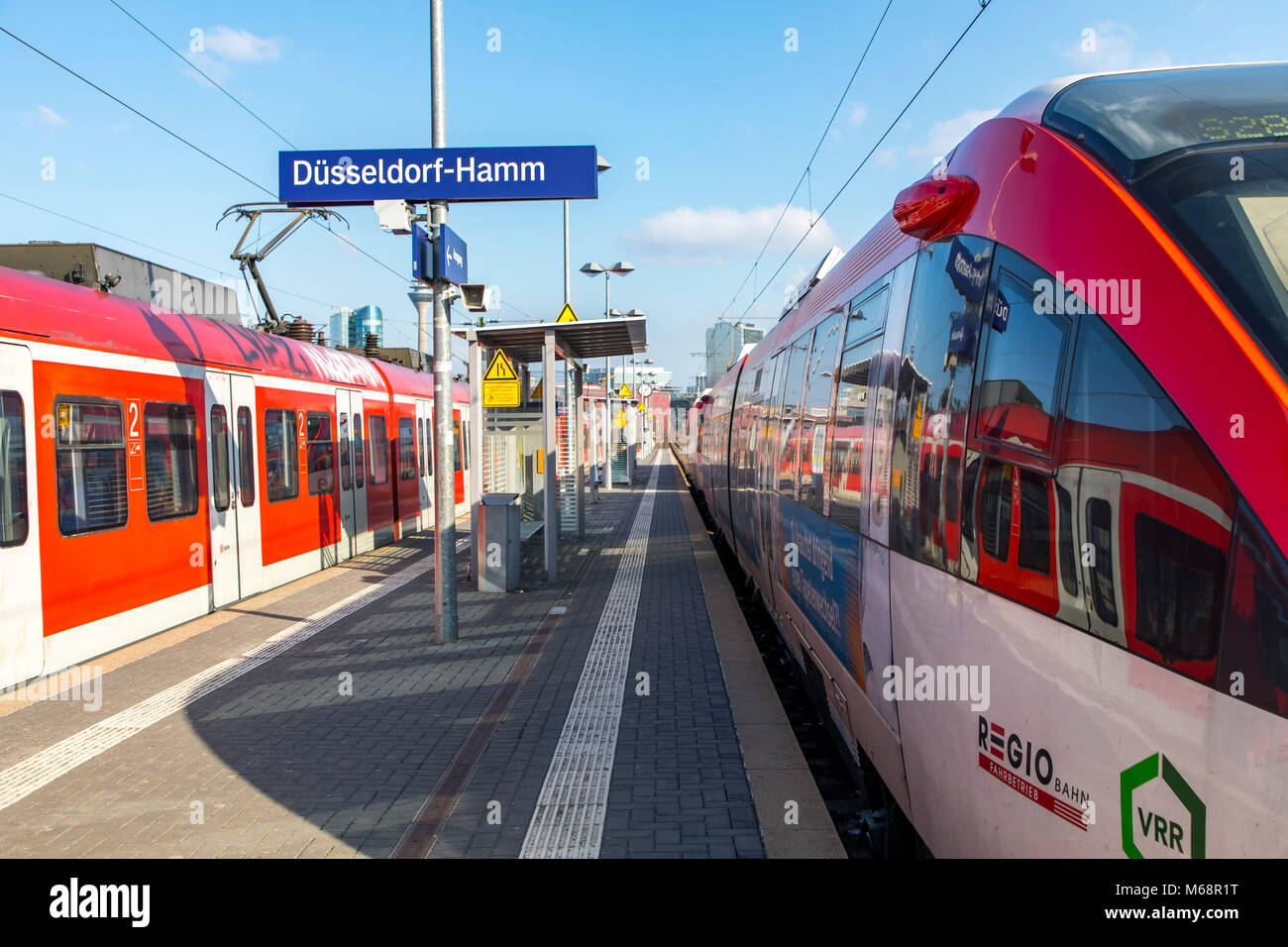 S-Bahn, Local train station, Dusseldorf-Hamm stop, the skyline of ...