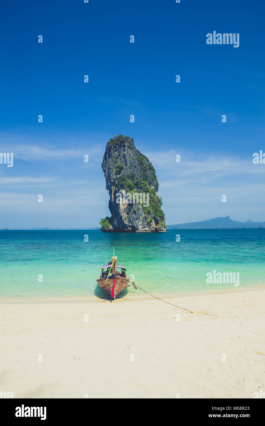 Beautiful calm quiet sea one boat park at private placid island Stock ...