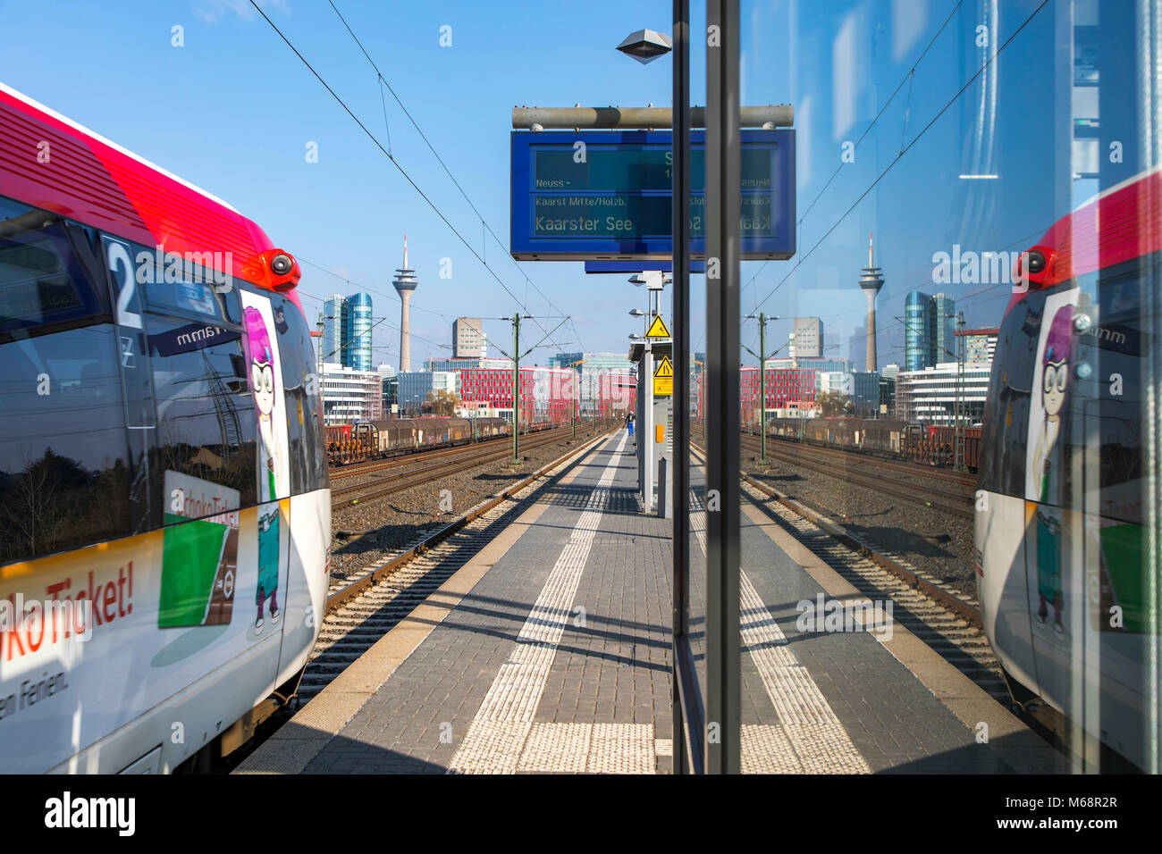 S-Bahn, Local train station, Dusseldorf-Hamm stop, the skyline of ...