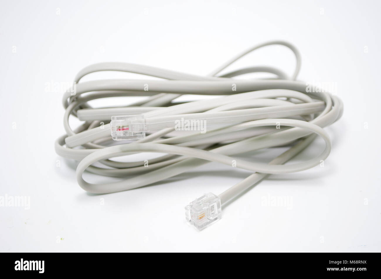 An internet cable isolated on a white background Stock Photo - Alamy