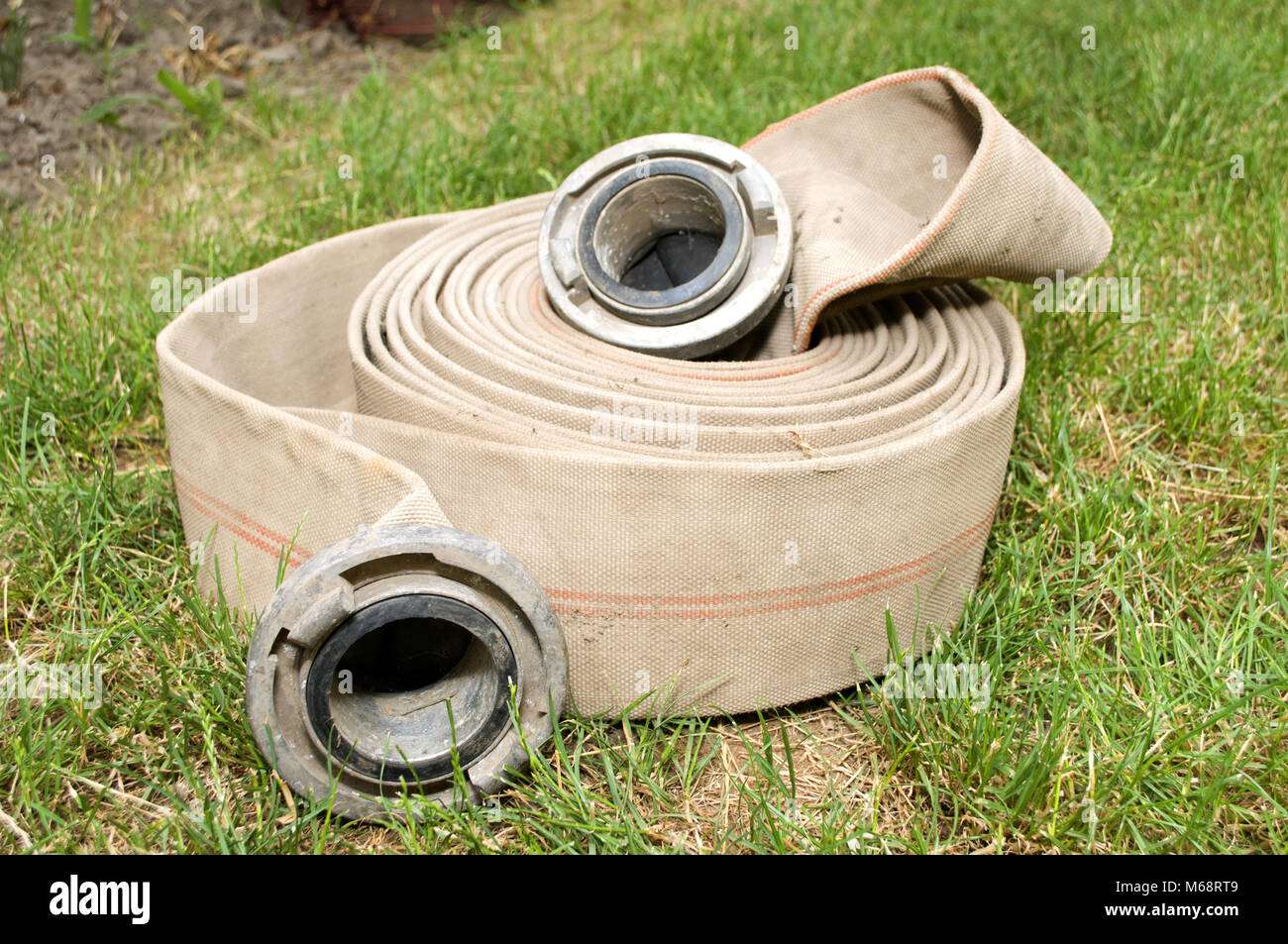 Fire hose for water Stock Photo - Alamy