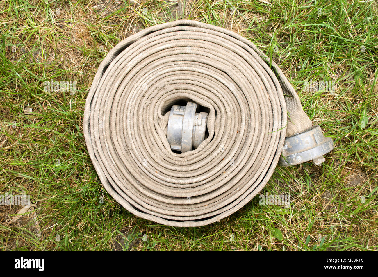 Fire hose for water Stock Photo - Alamy