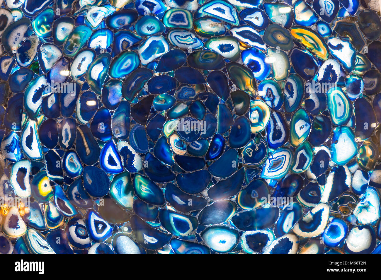 Arrangement of blue stones or mineral fragments on the subject of art ...