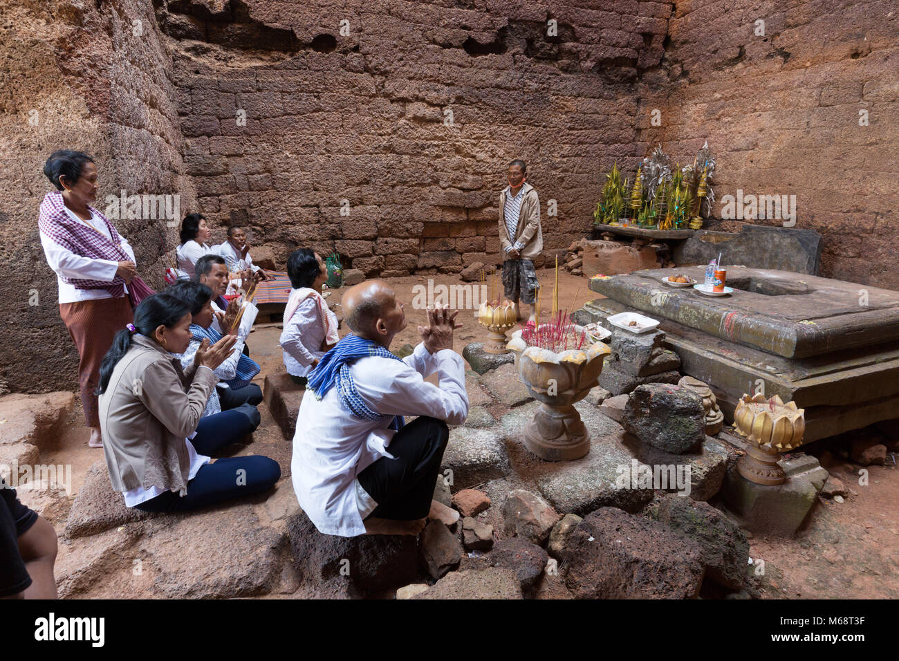 Buddhist religious ceremony in the interior of Phnom Da, an 11th ...