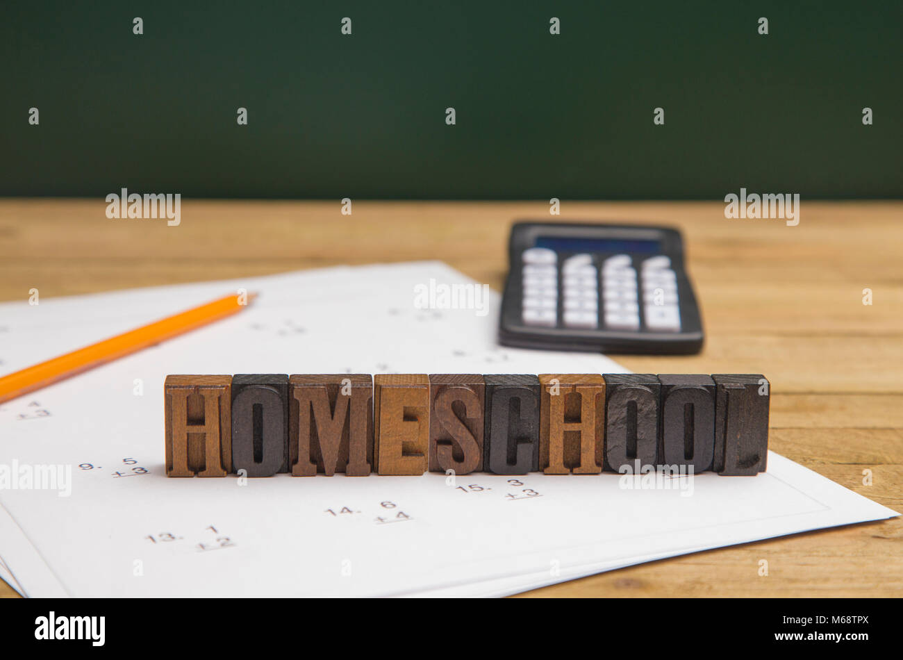 "Home School" Spelled Out with Homework on the Table Stock Photo - Alamy