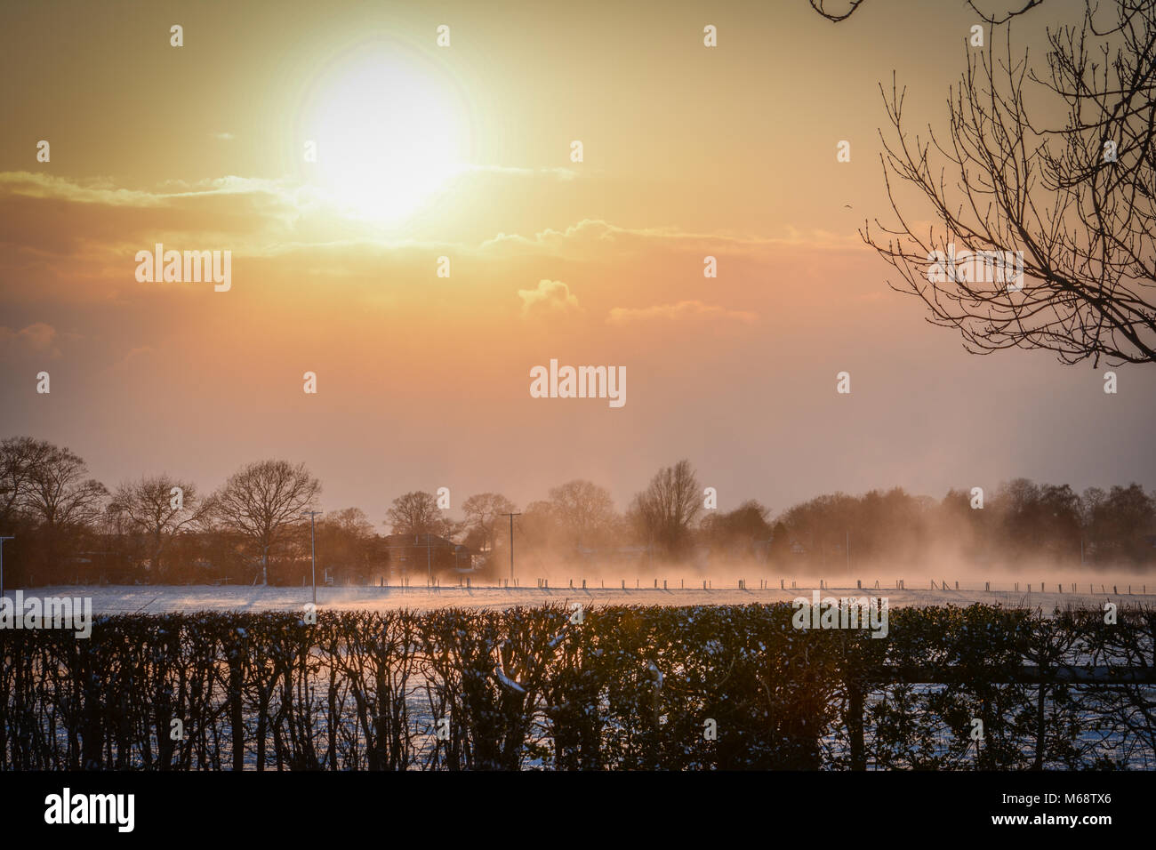 Snow and Sunset Stock Photo - Alamy
