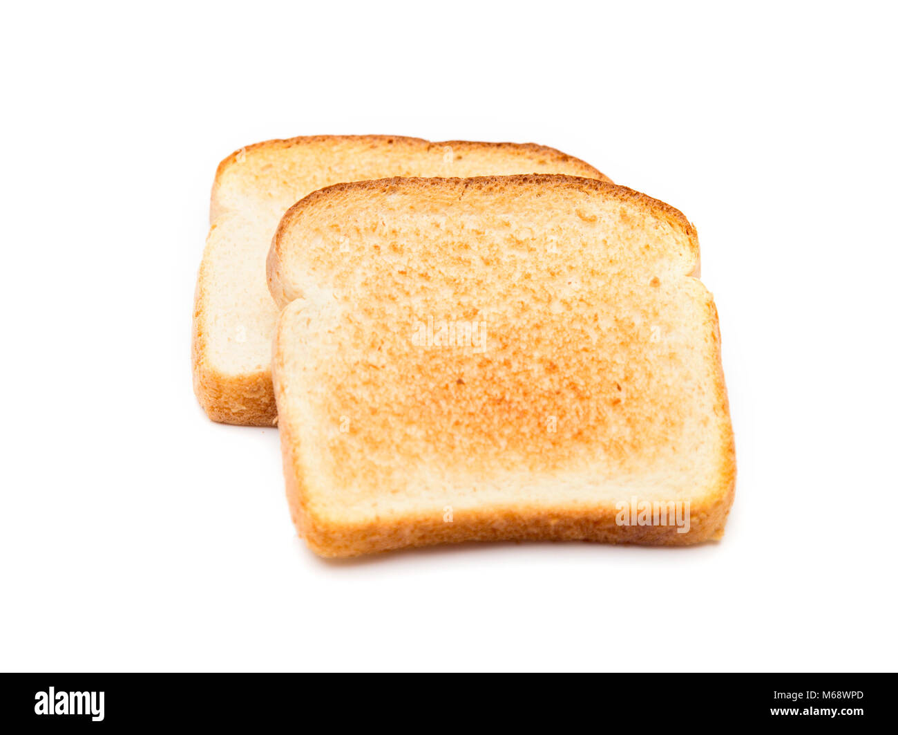 Slighty Golden Toast on a White Background Stock Photo - Alamy