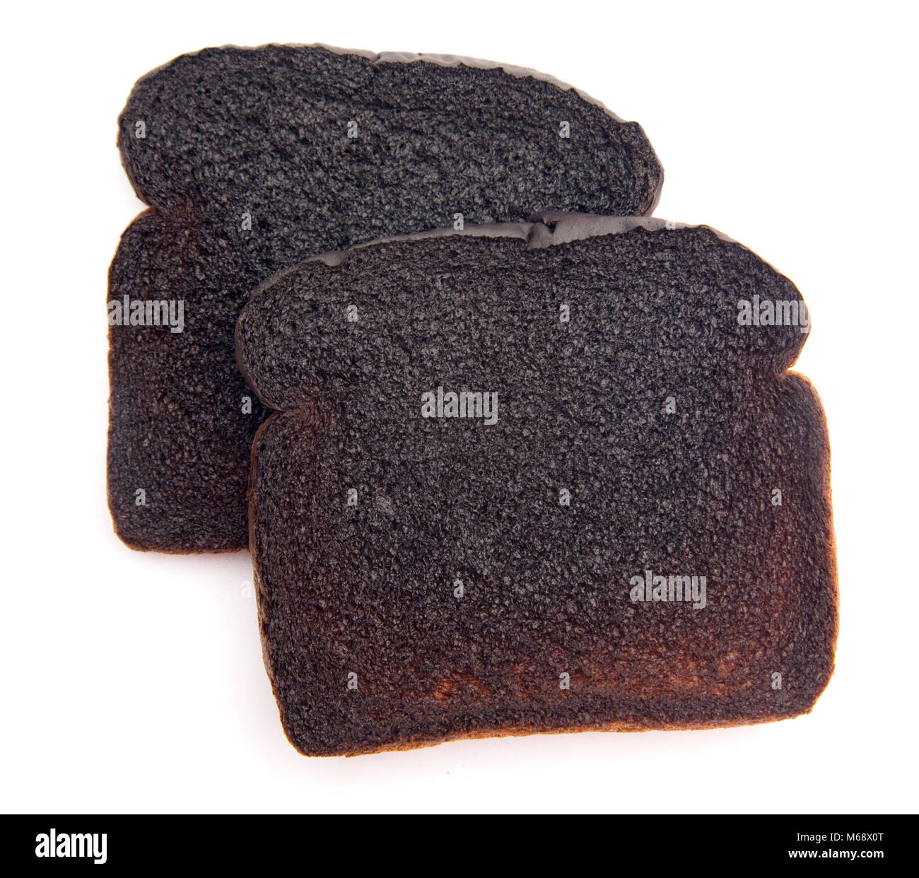 Burned Toast on a White Background Stock Photo - Alamy