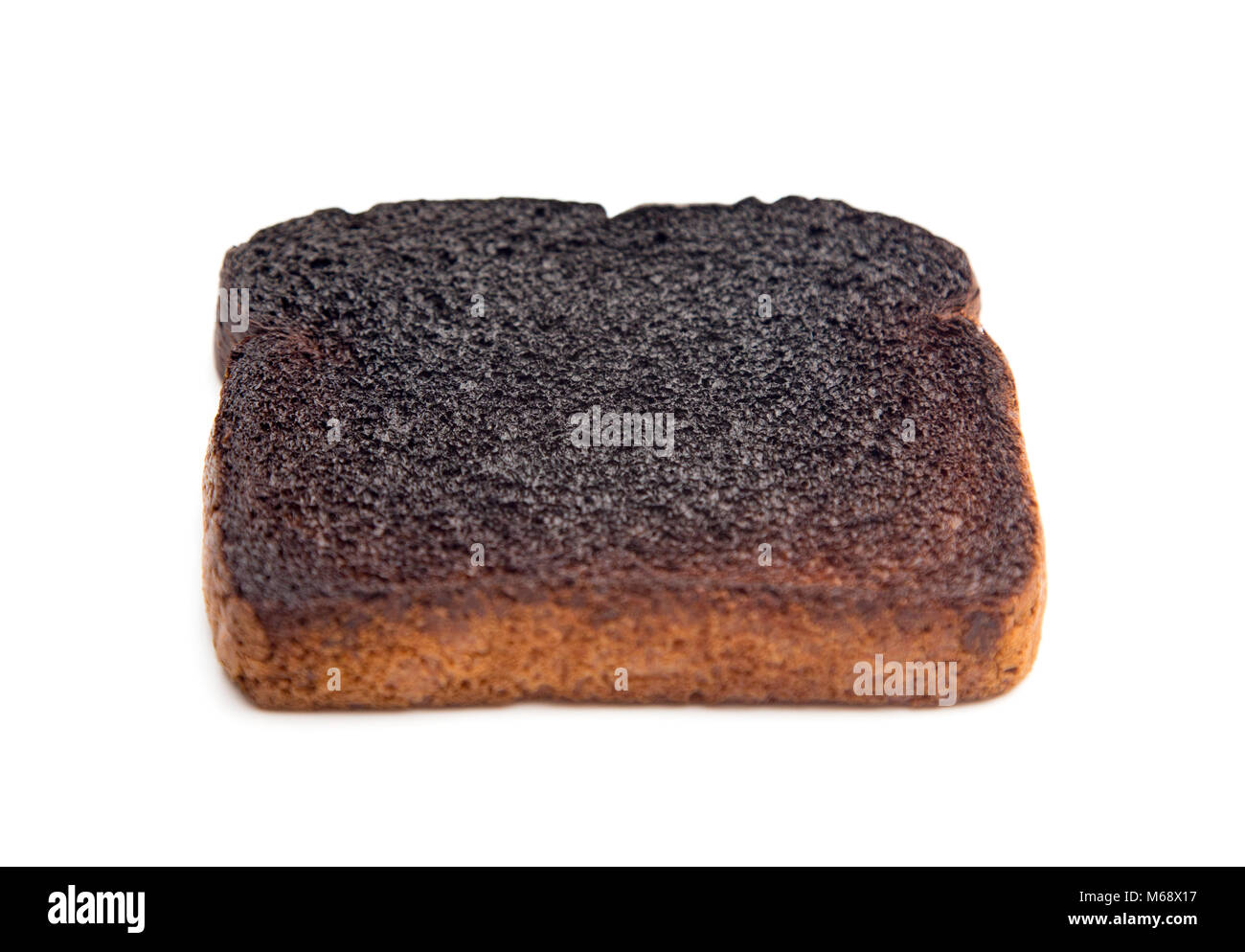 Burned Toast on a White Background Stock Photo - Alamy