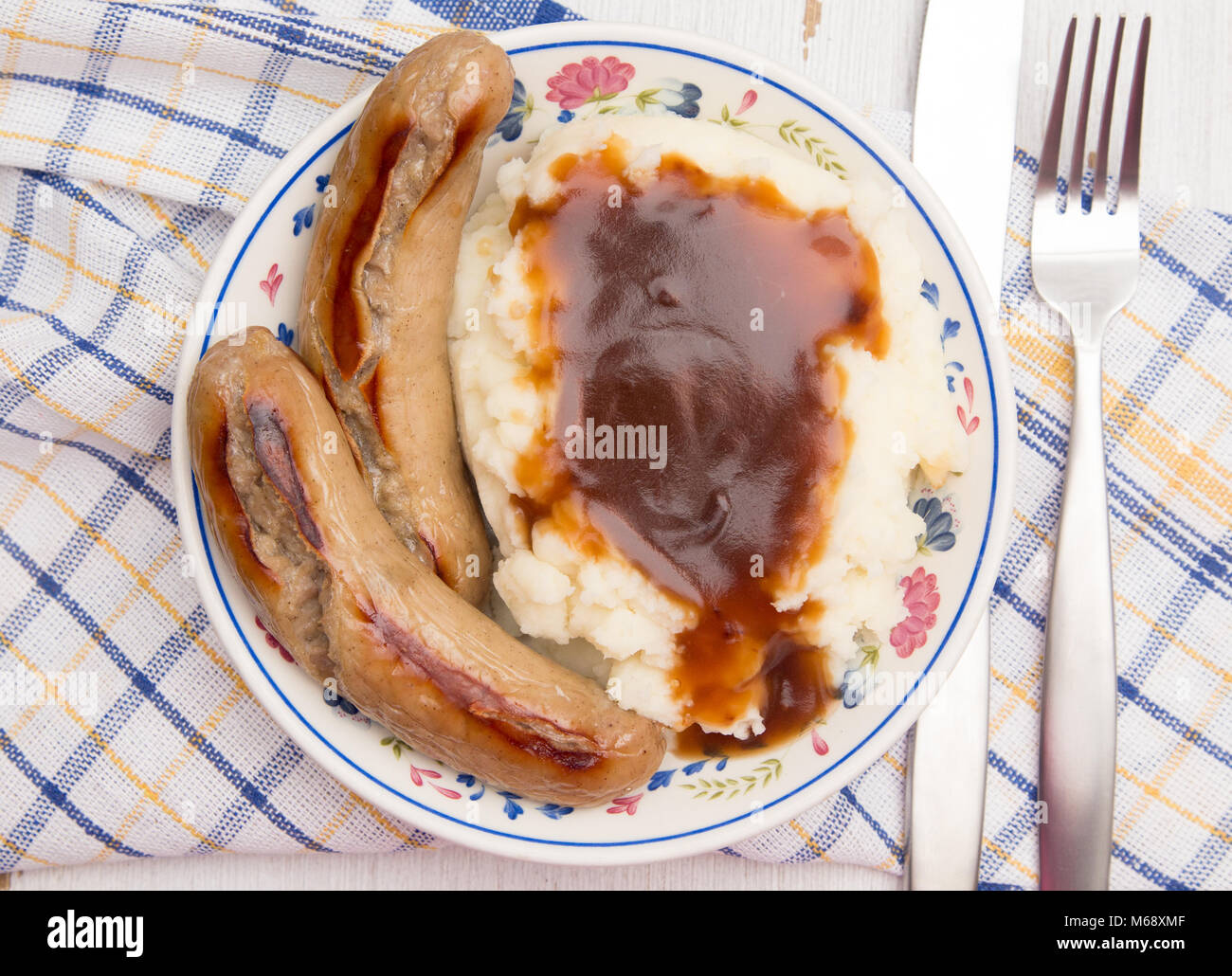 British Classic of Bangers and Mash on a White Background Stock Photo ...