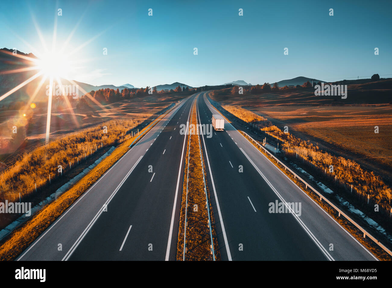 Driving on open road at beautiful sunny day. Aerial view Stock Photo ...