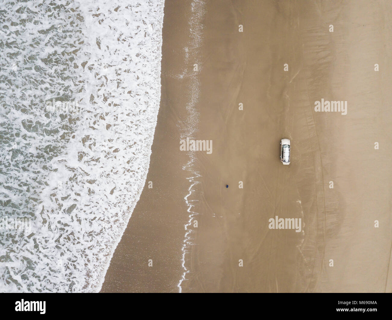 Aerial view of a car parked on a sandy beach in Oregon Coast Stock ...