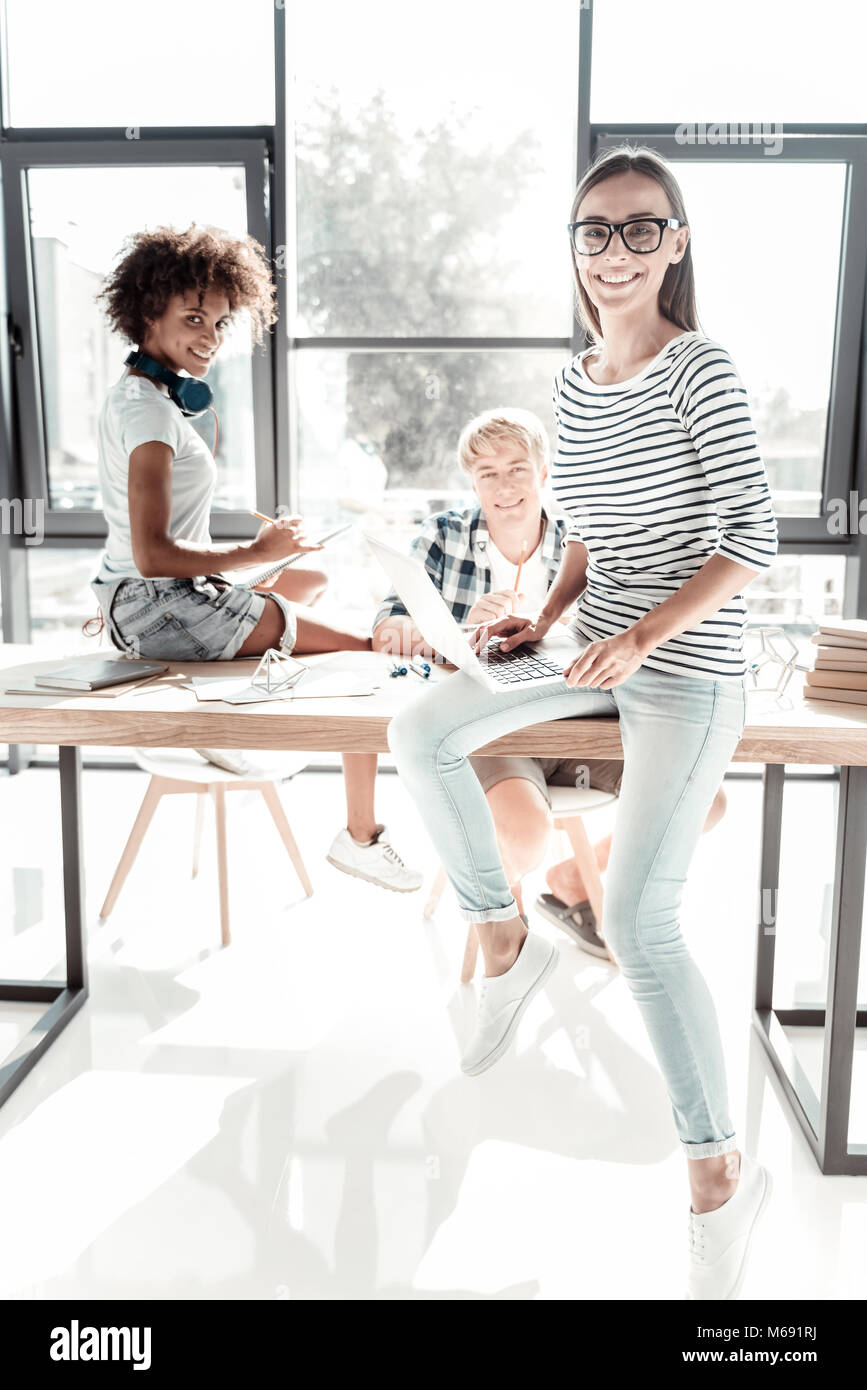 Joyful happy people working as a team Stock Photo - Alamy