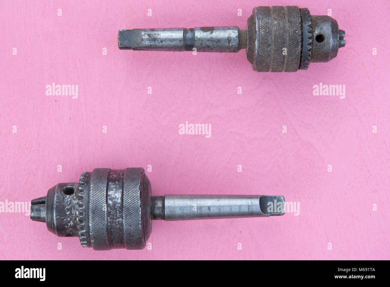 tools on a pink background Stock Photo - Alamy