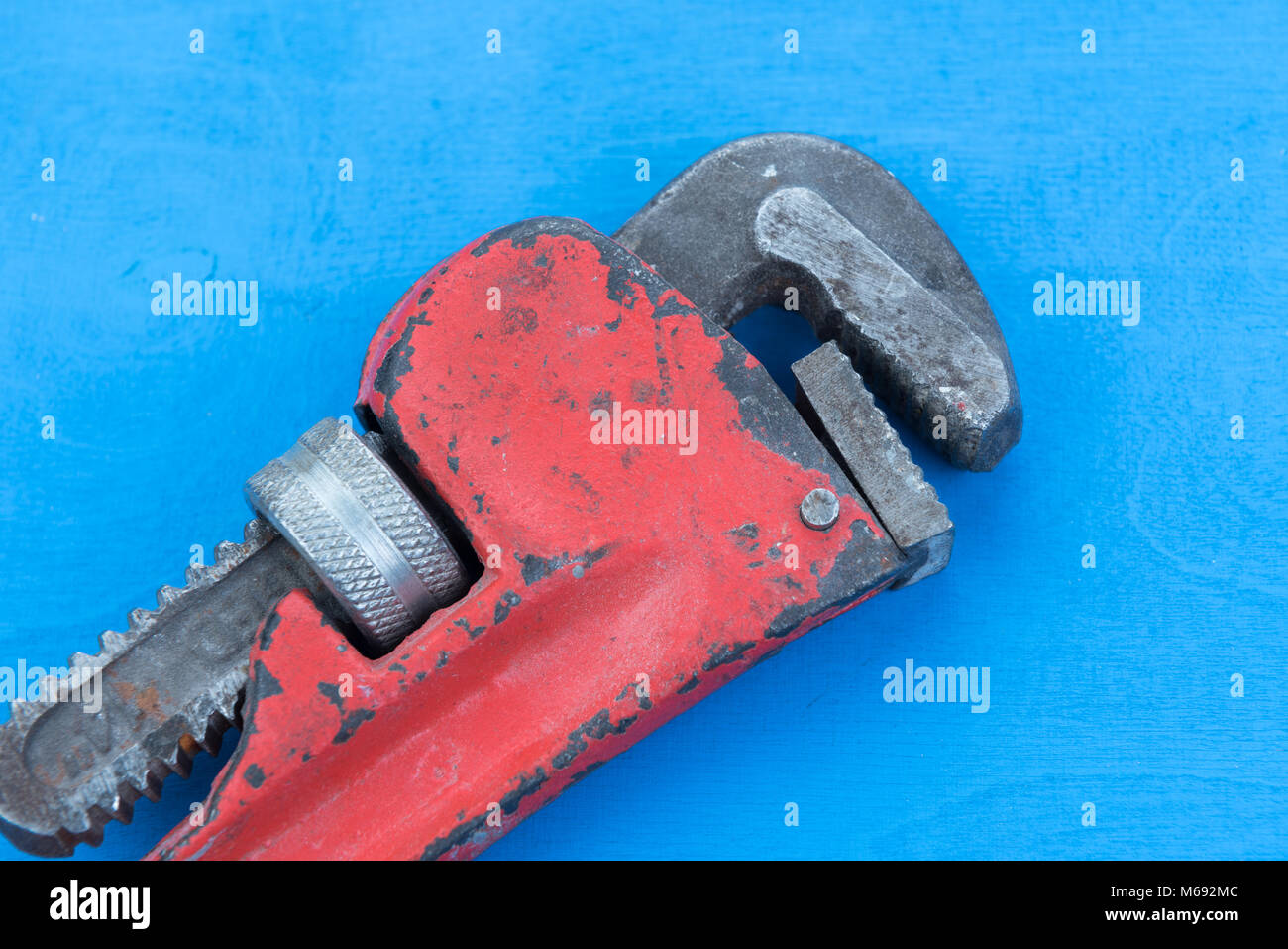 tools on a blue background Stock Photo - Alamy