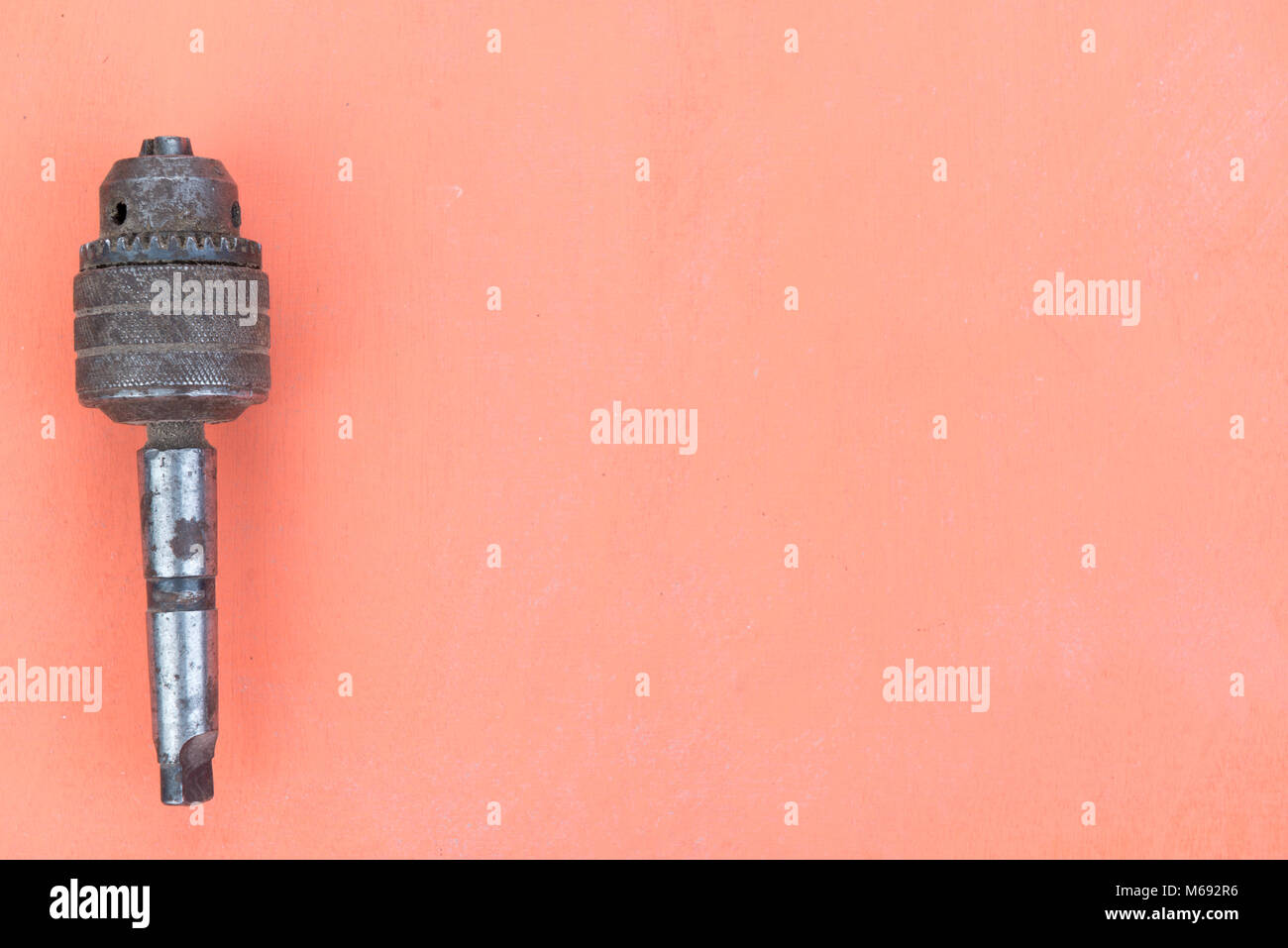 tools on a orange background Stock Photo - Alamy