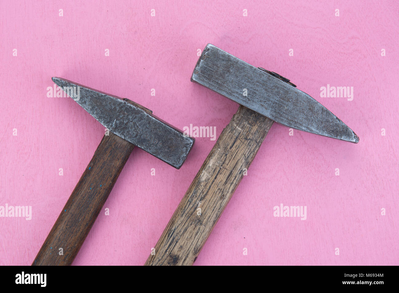 tools on a pink background Stock Photo - Alamy
