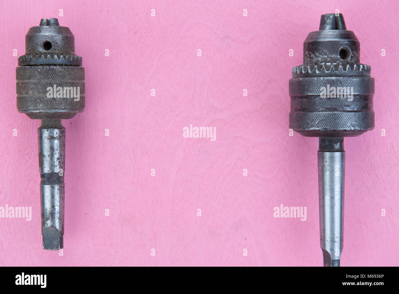 tools on a pink background Stock Photo - Alamy