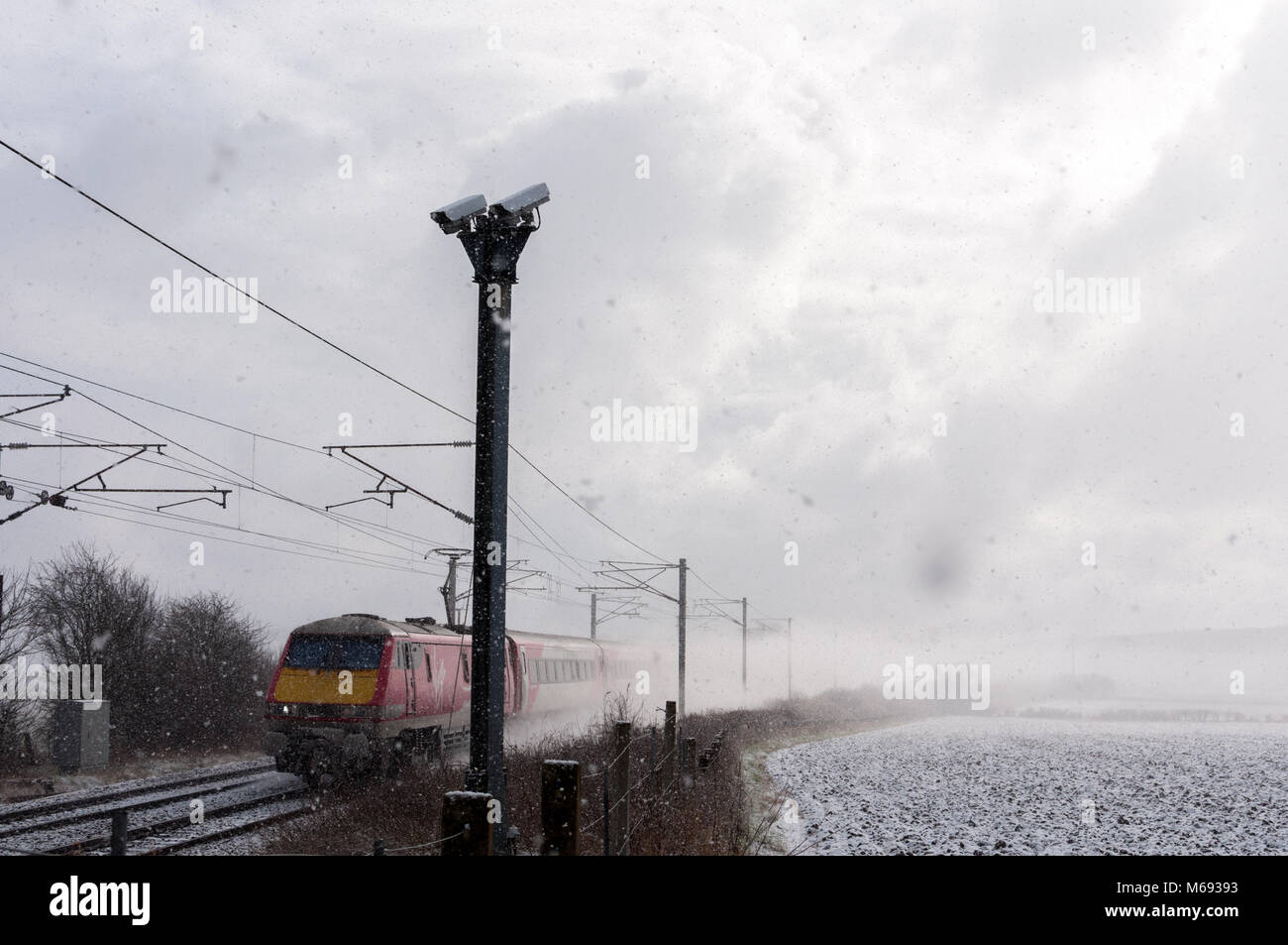 Virgin East Coast train battles through snow of Storm Emma. East Coast ...