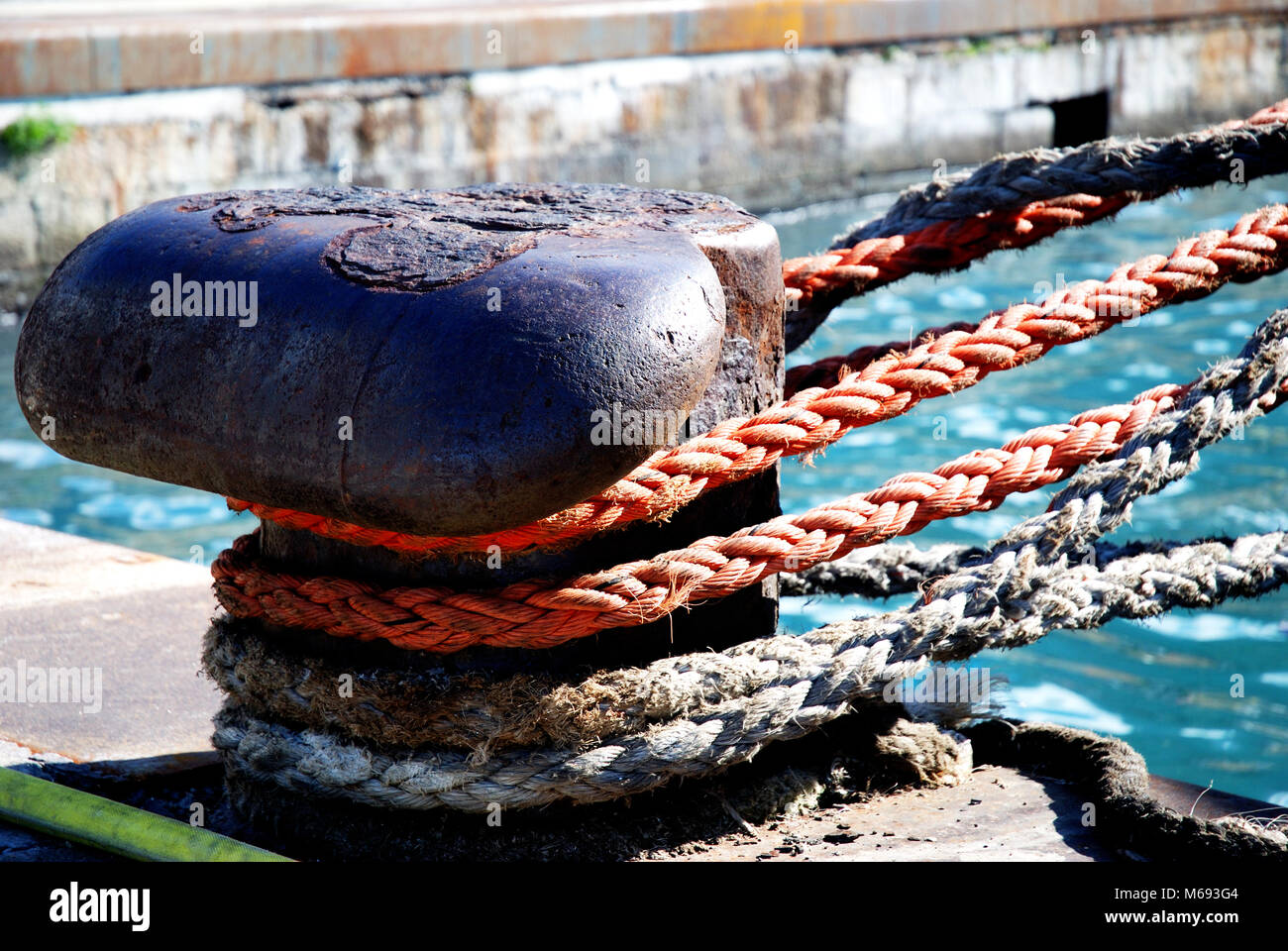 mooring rope of a large ship in the port Stock Photo - Alamy