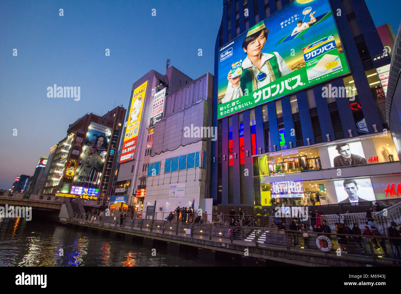 Early evening nightlife in the busy area around Dotonbori, Osaka, Japan ...