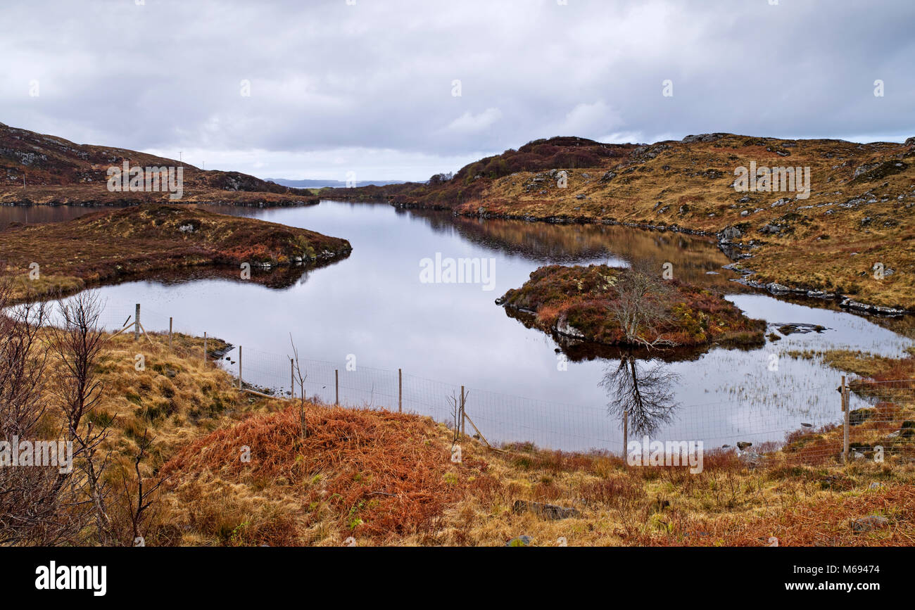 North Coast 500 - beautiful little roadside lochan on the A894 road ...