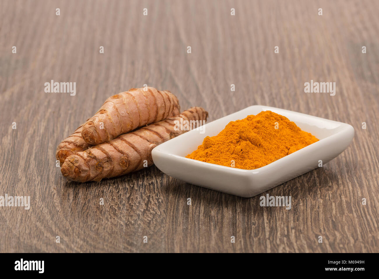Turmeric root and powder hi-res stock photography and images - Alamy