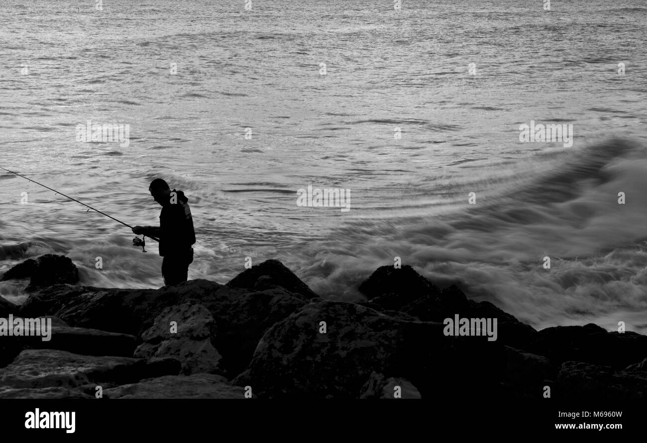 Fishing of rocks Black and White Stock Photos & Images - Alamy