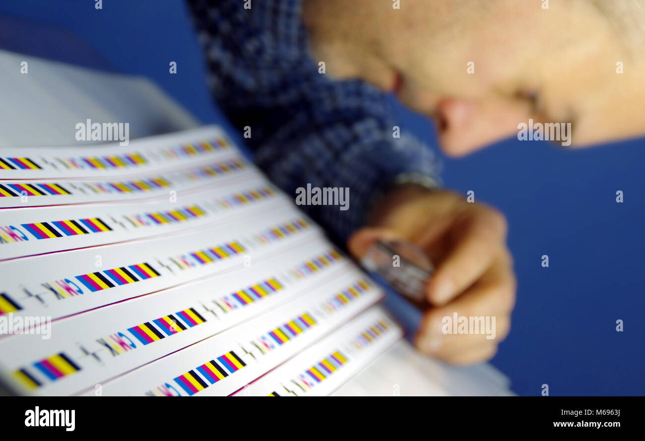 Print test controlling cmyk and registration mark on printout. Man ...