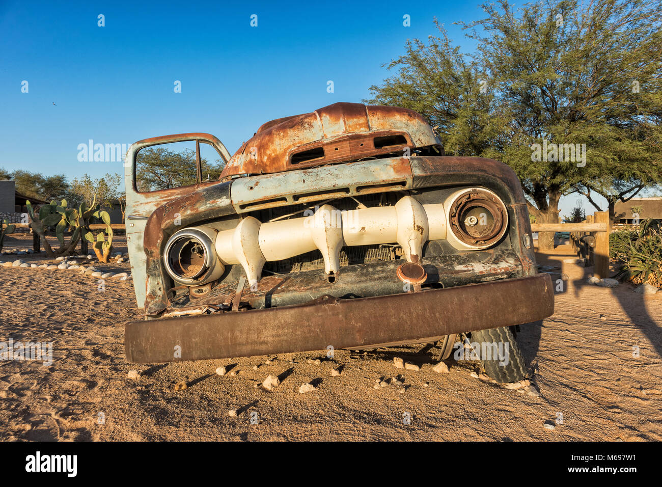 Old and abandoned car in the desert of Namibia. Solitaire. With the ...